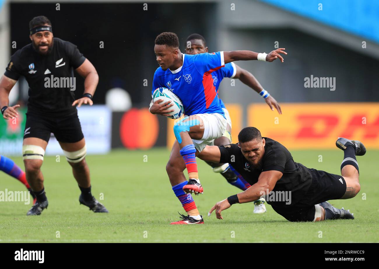 Namibia's Helarius Kisting struggles to keep a ball during the second ...