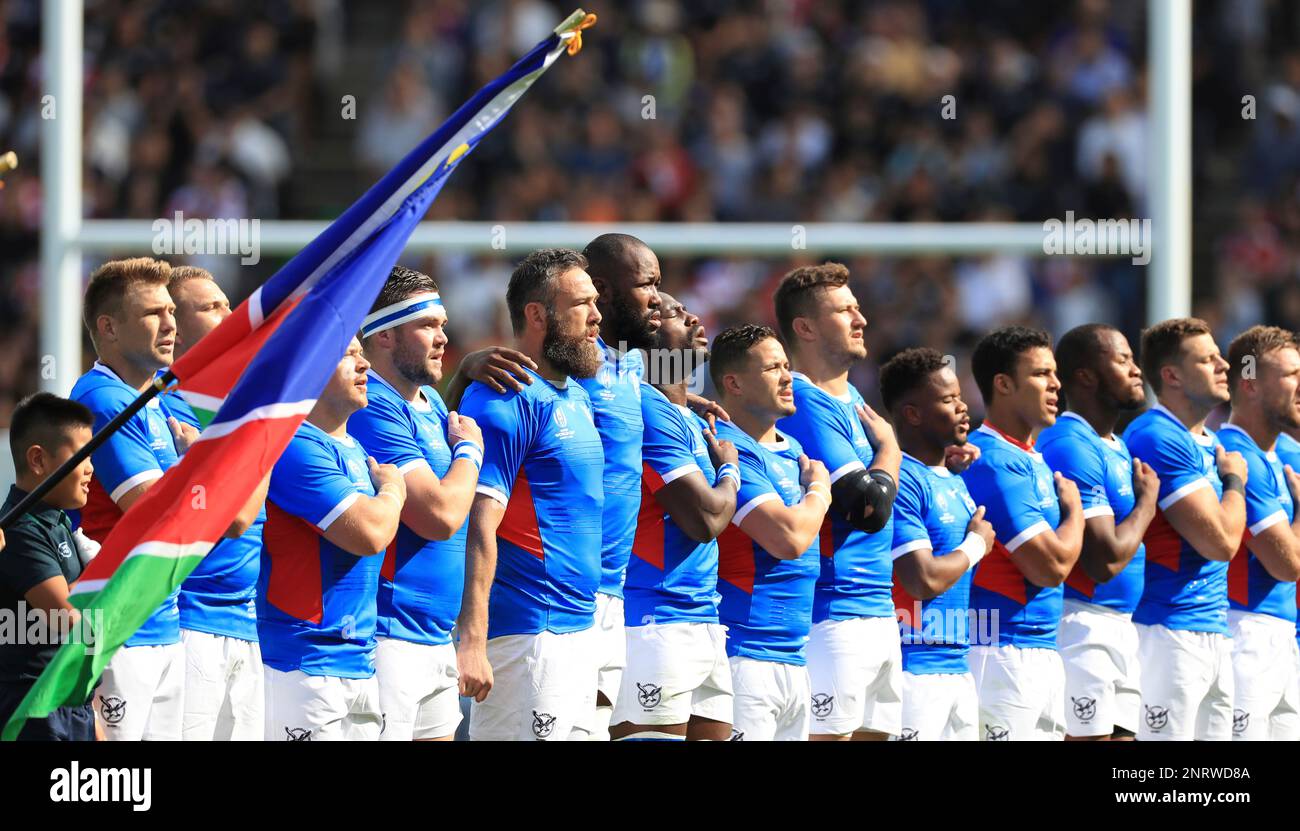 Namibia's players sing a national anthem prior to the Pool B match in ...