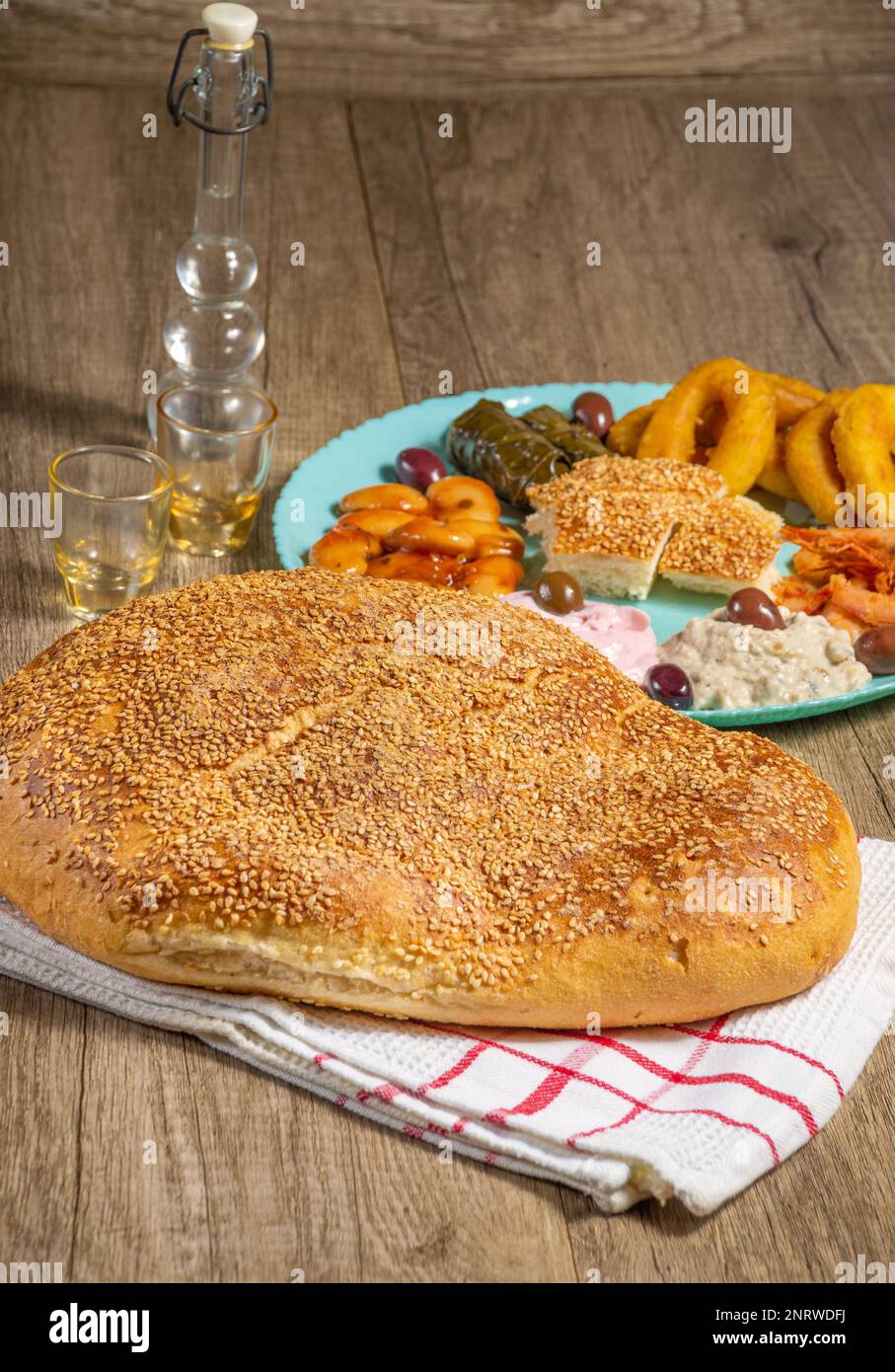 Traditional greek bread ( lagana ) with Greek traditional fasting food ...