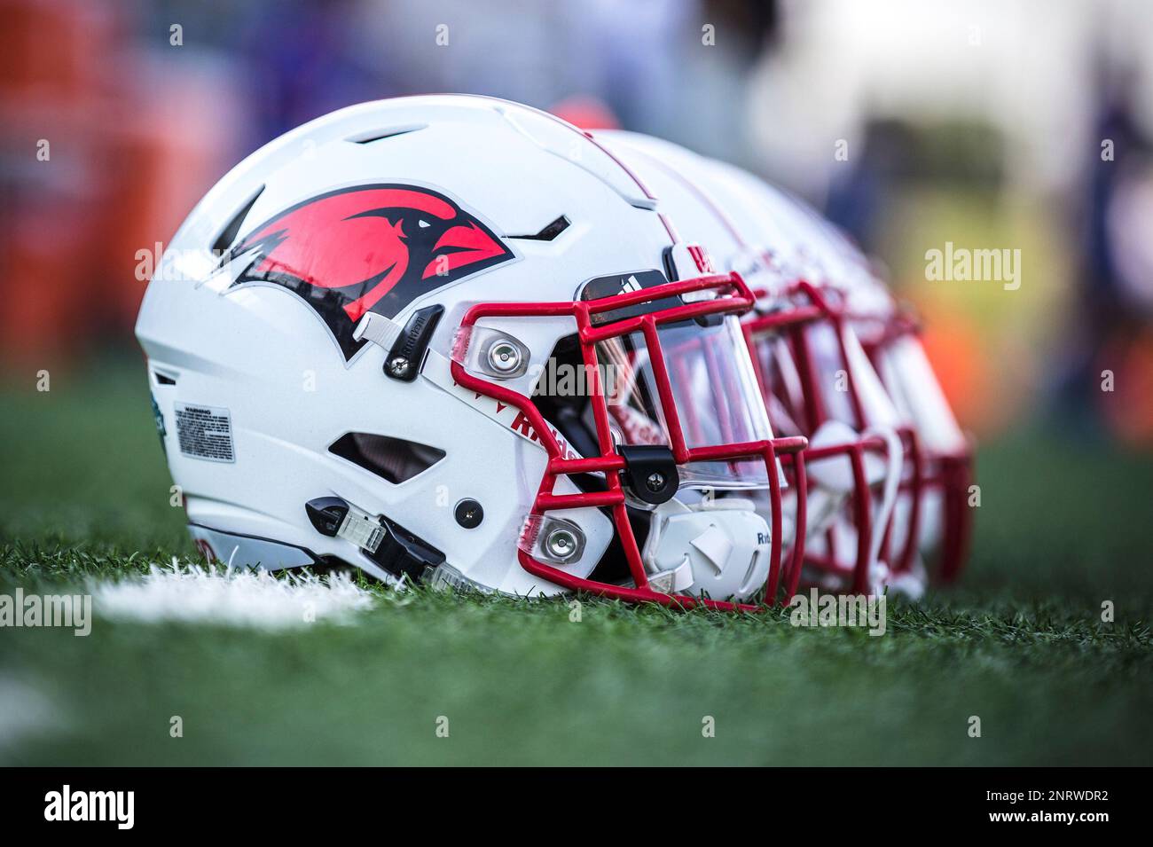 October 5, 2019: Incarnate Word football helmets sit on the sideline ...