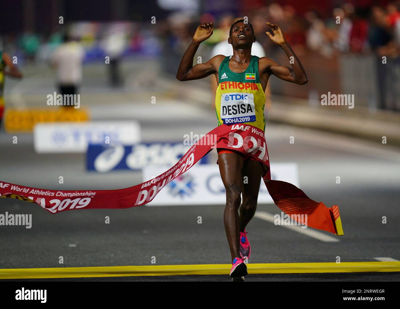 Ethiopia's Lelisa DESISA reacts as he wins the Marathon Men of IAAF ...