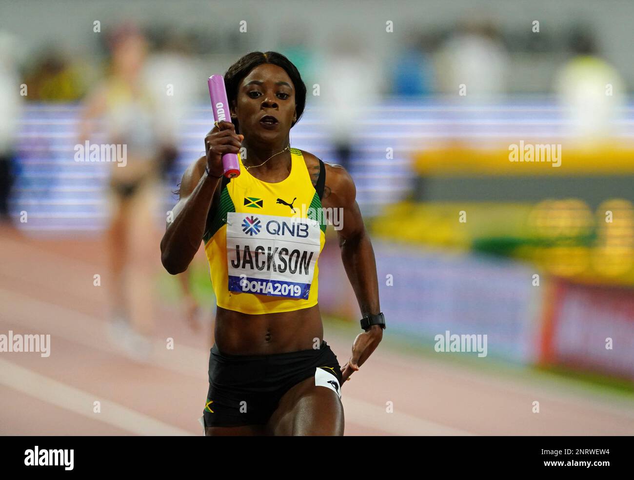 Jamaica's Shericka JACKSON and other 4th runners compete during 4X100 ...
