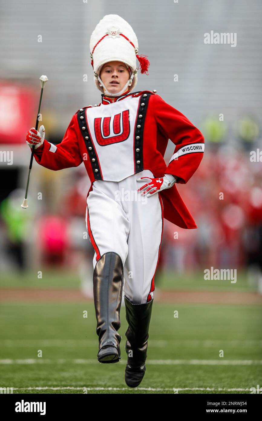 MADISON, WI - OCTOBER 05: Wisconsin drum major leads the marching band ...