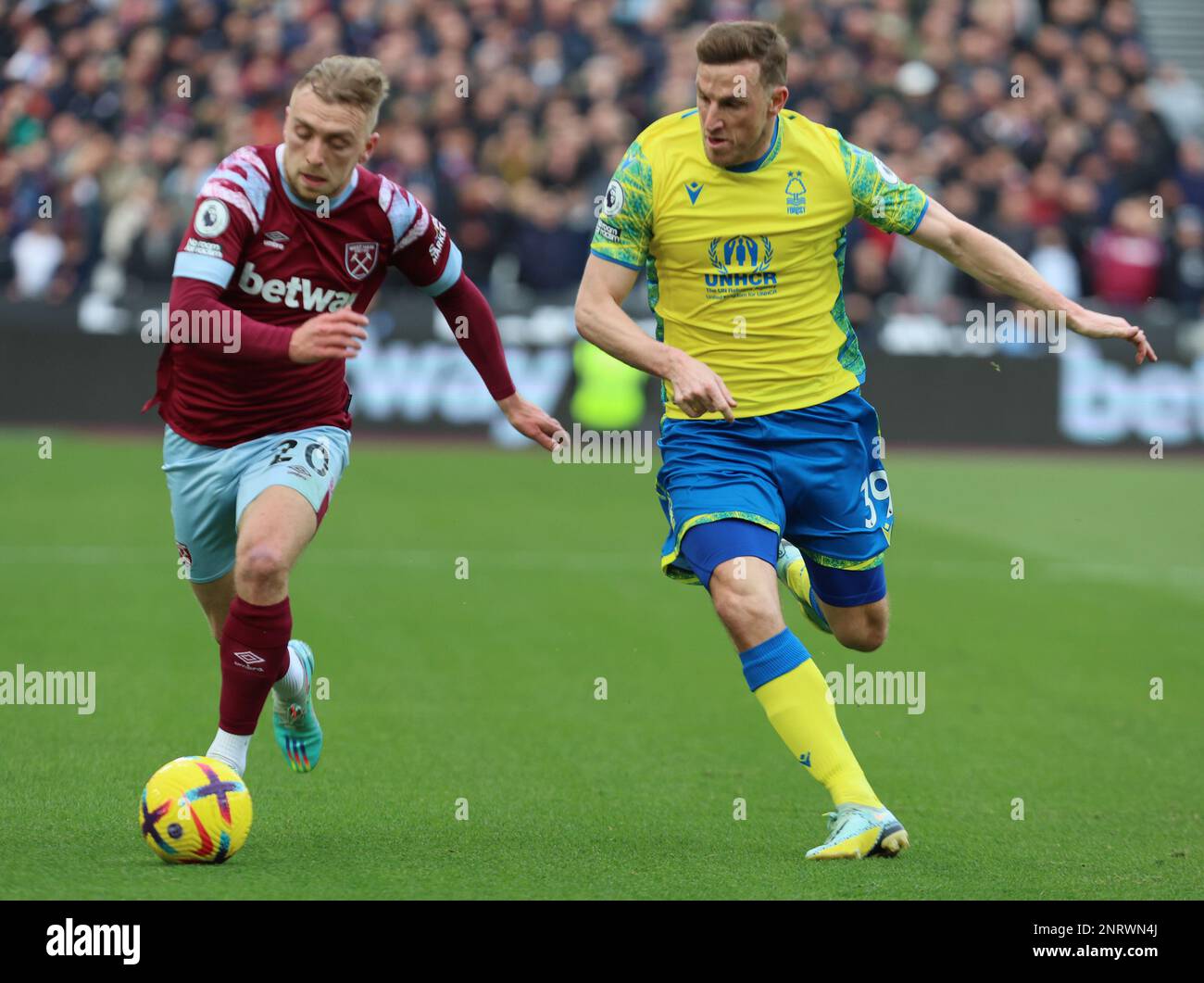 L-R West Ham United's Jarrod Bowen takes on Chris Wood (on loan from ...