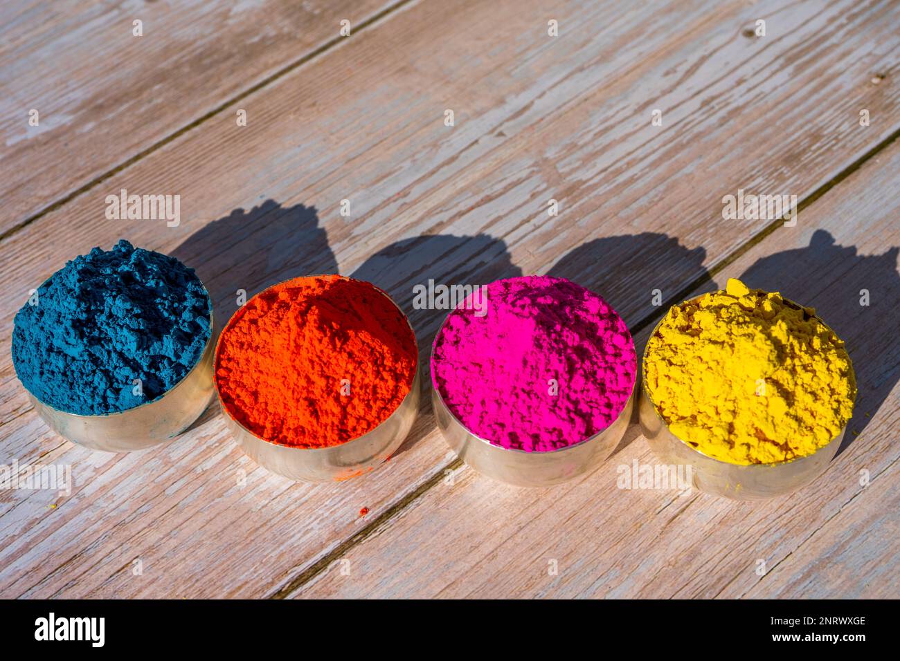 Colorful powder organic Gulal colors in bowls for Indian Holi festival ...