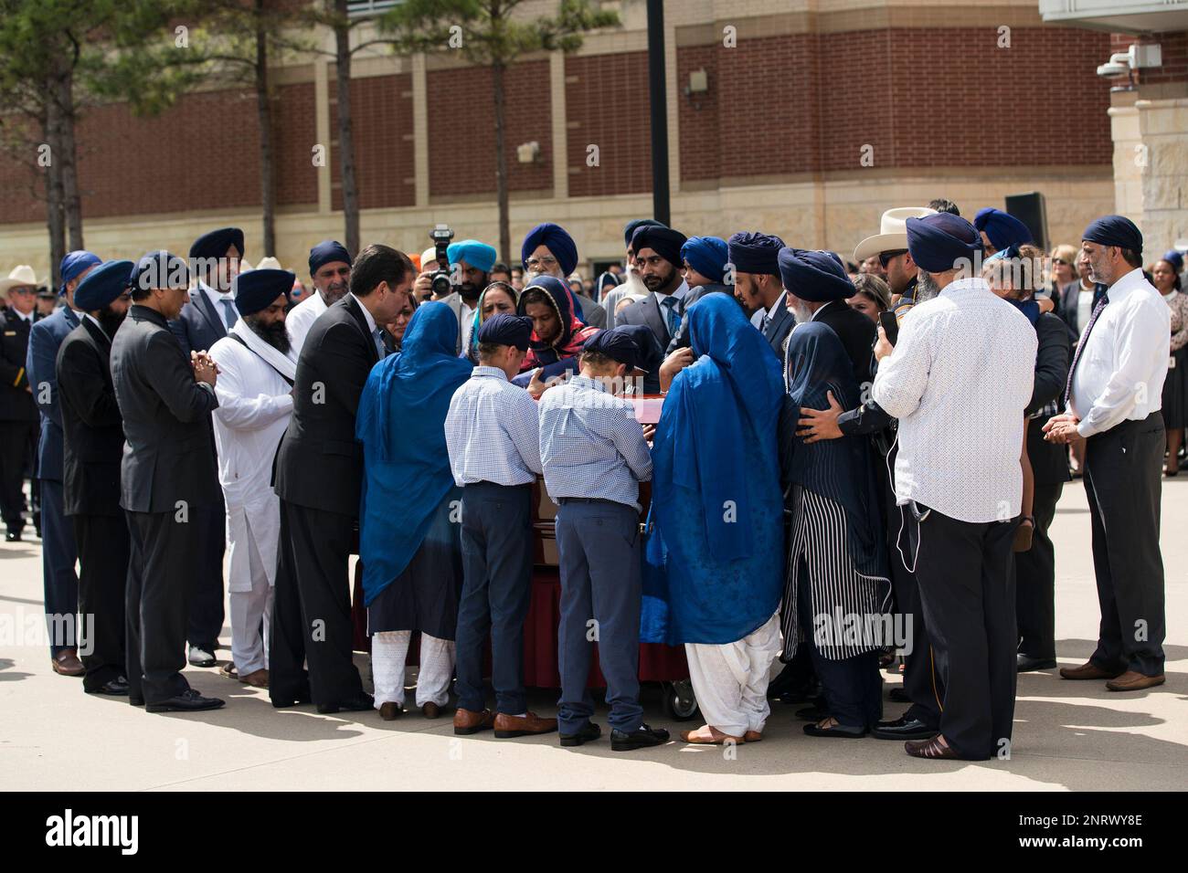 The family of Harris County Sheriff's Deputy Sandeep Dhaliwal gather ...