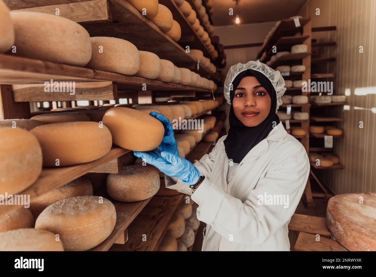 Arab investor in a warehouse of the cheese production industry Stock ...