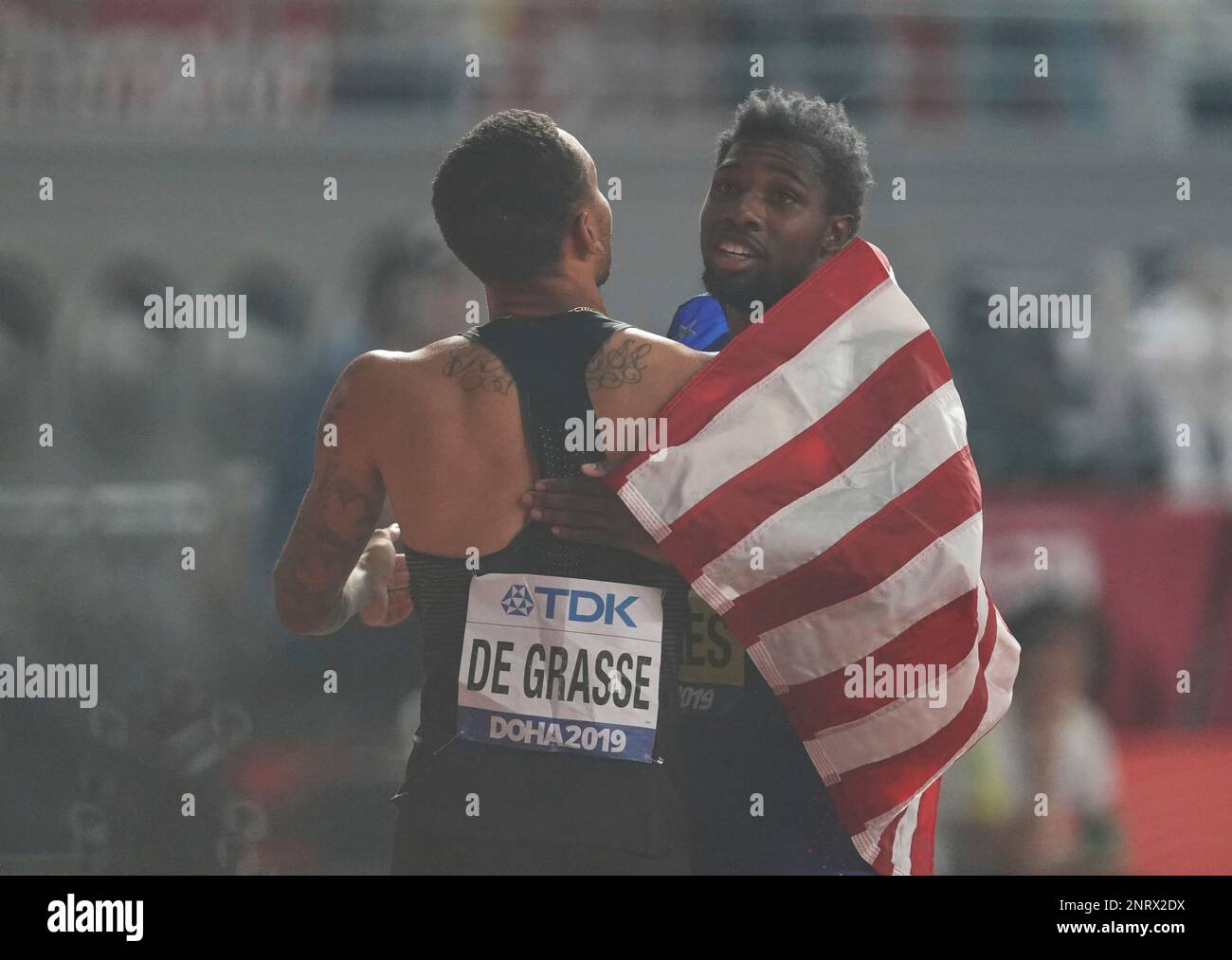 U.S. Noah LYLES (R) celebrates with Andre DE GRASSE of Canada after ...