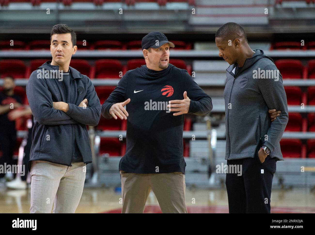 Toronto Raptors head coach Nick Nurse, center, gestures while talking ...