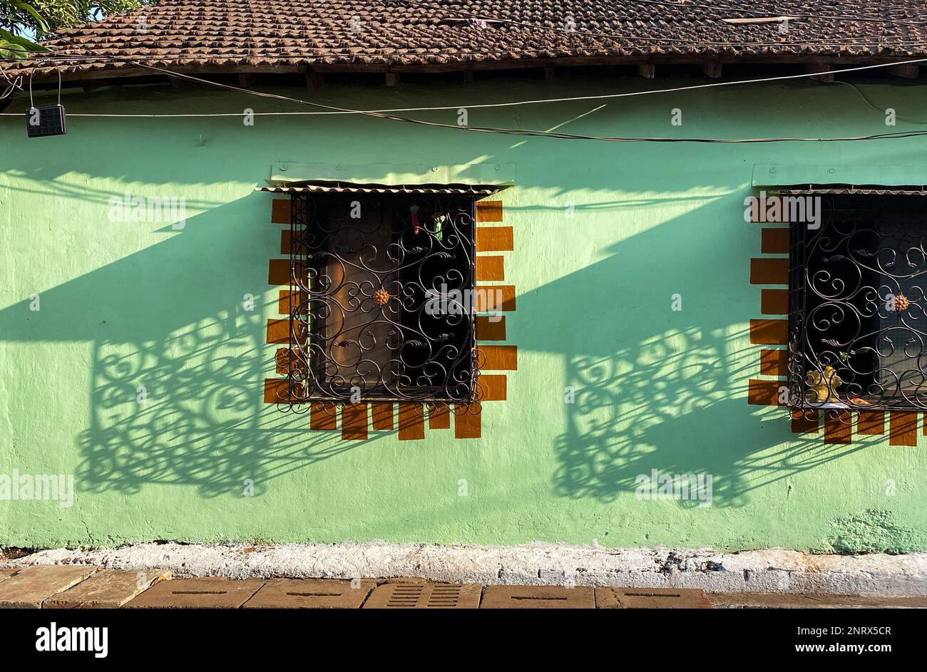 Panjim, Goa, India - January 2023: Vintage windows making long shadows ...