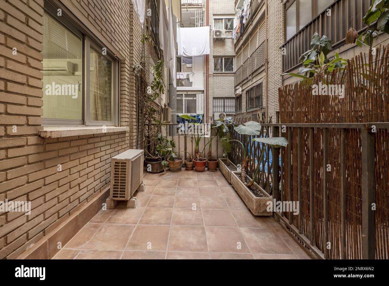 Terrace of a house on the ground floor in the inner courtyard of an ...