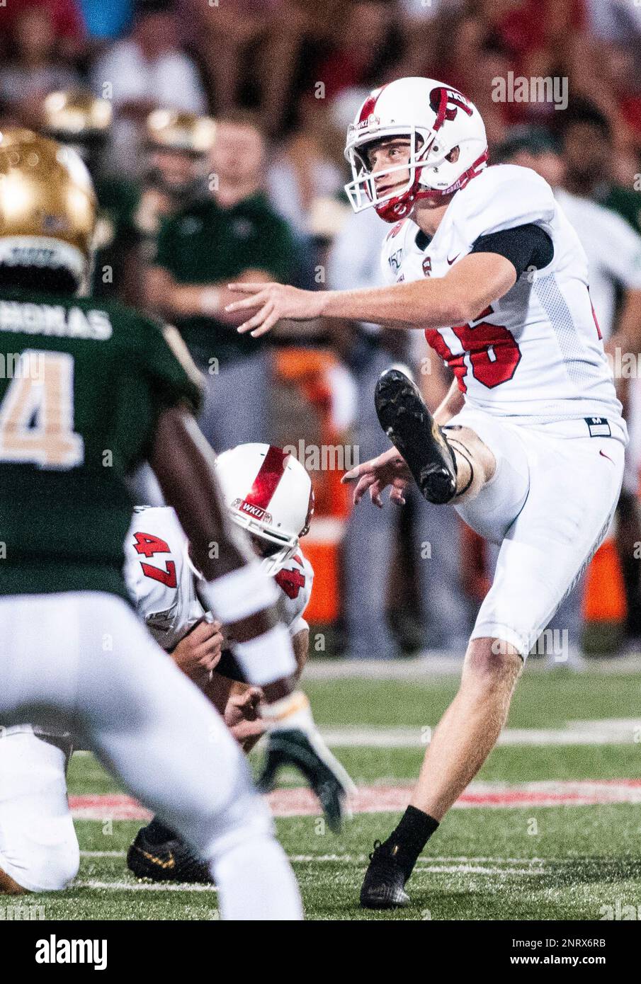 Western Kentucky Hilltoppers place kicker Cory Munson (46) kicks a ...