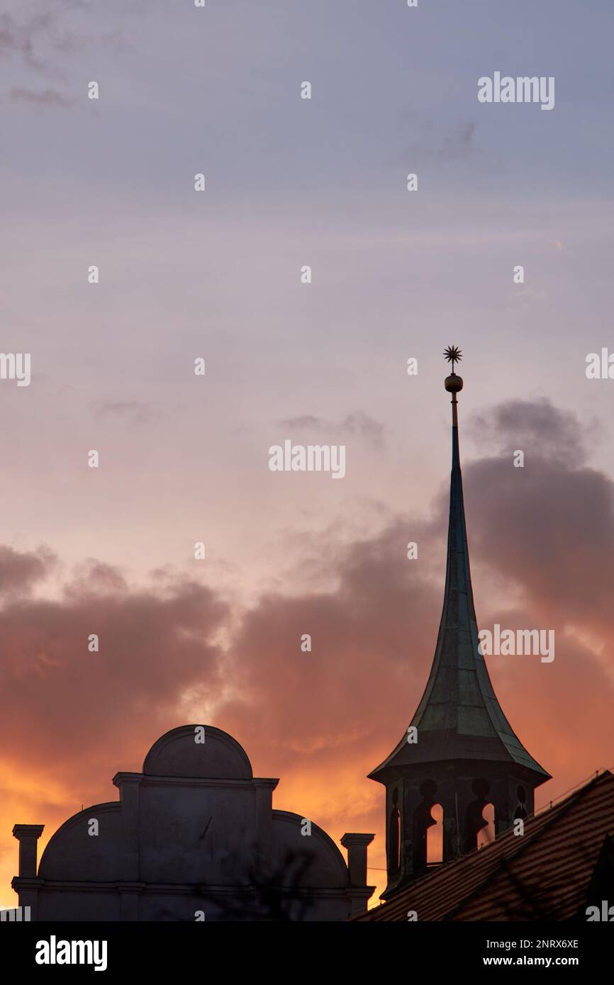 Roof and spire of a catholic church in Litomerice (Czech Republic) with ...