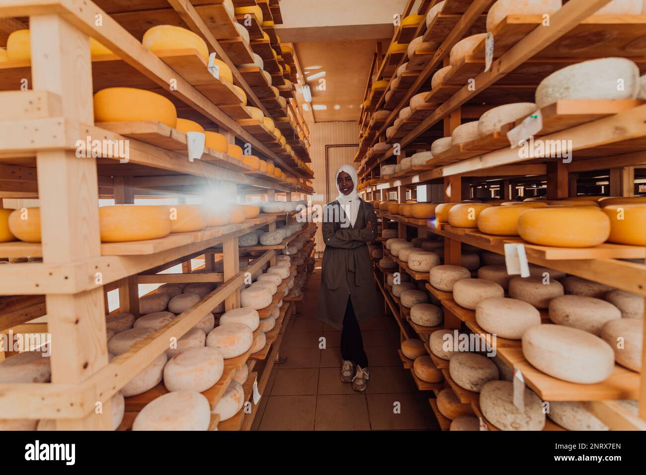 Arab investor in a warehouse of the cheese production industry Stock ...