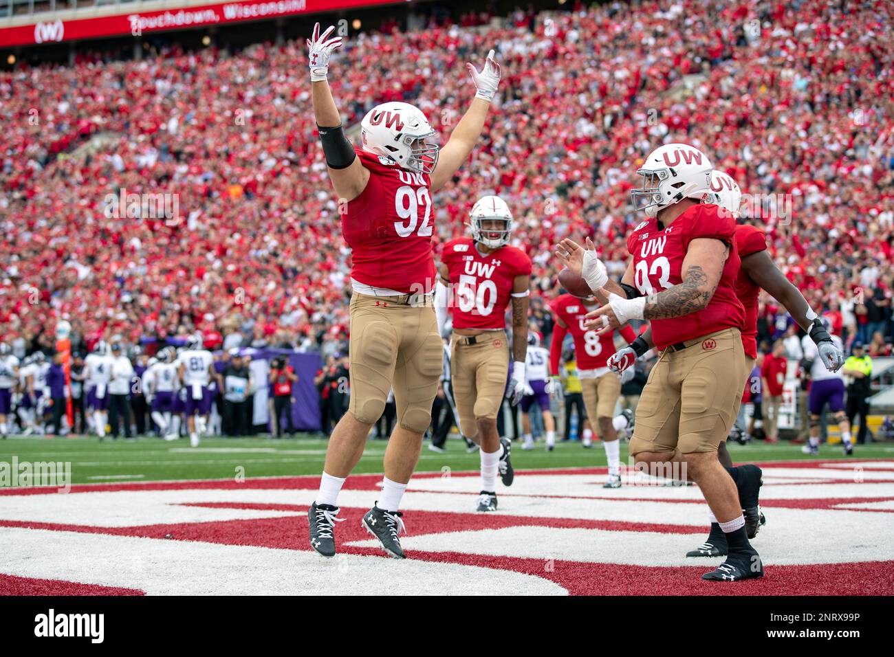 Wisconsin Badgers teammates celebrate Matt Henningsen (92) touchdown ...