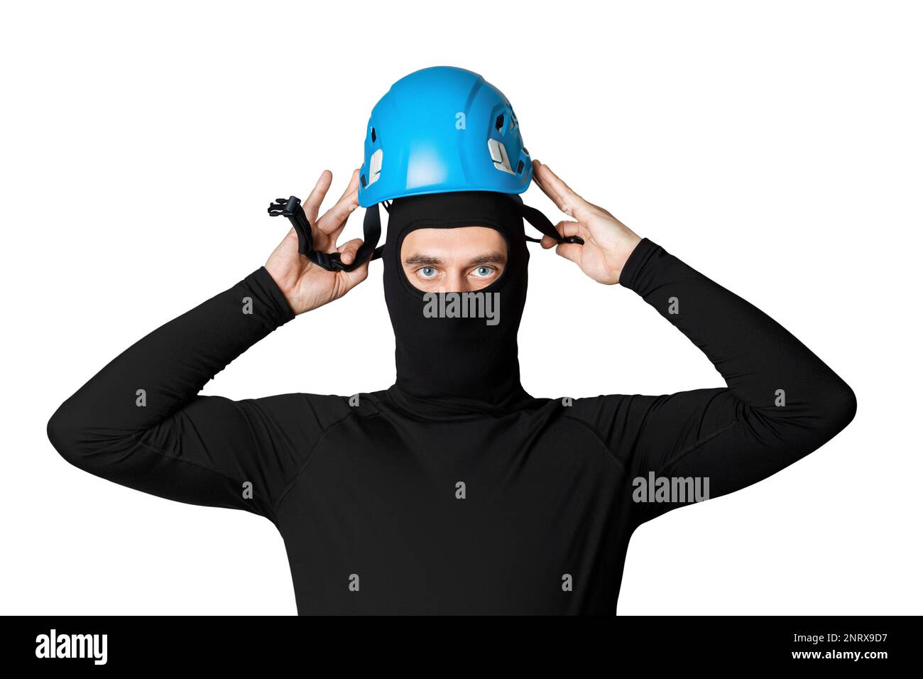 Man, tower worker. Work at height. Tourist, climber. He puts on a ...