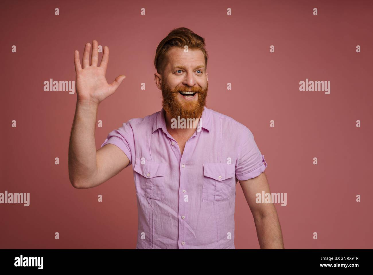 Ginger white man with beard smiling and waving hand at camera isolated ...