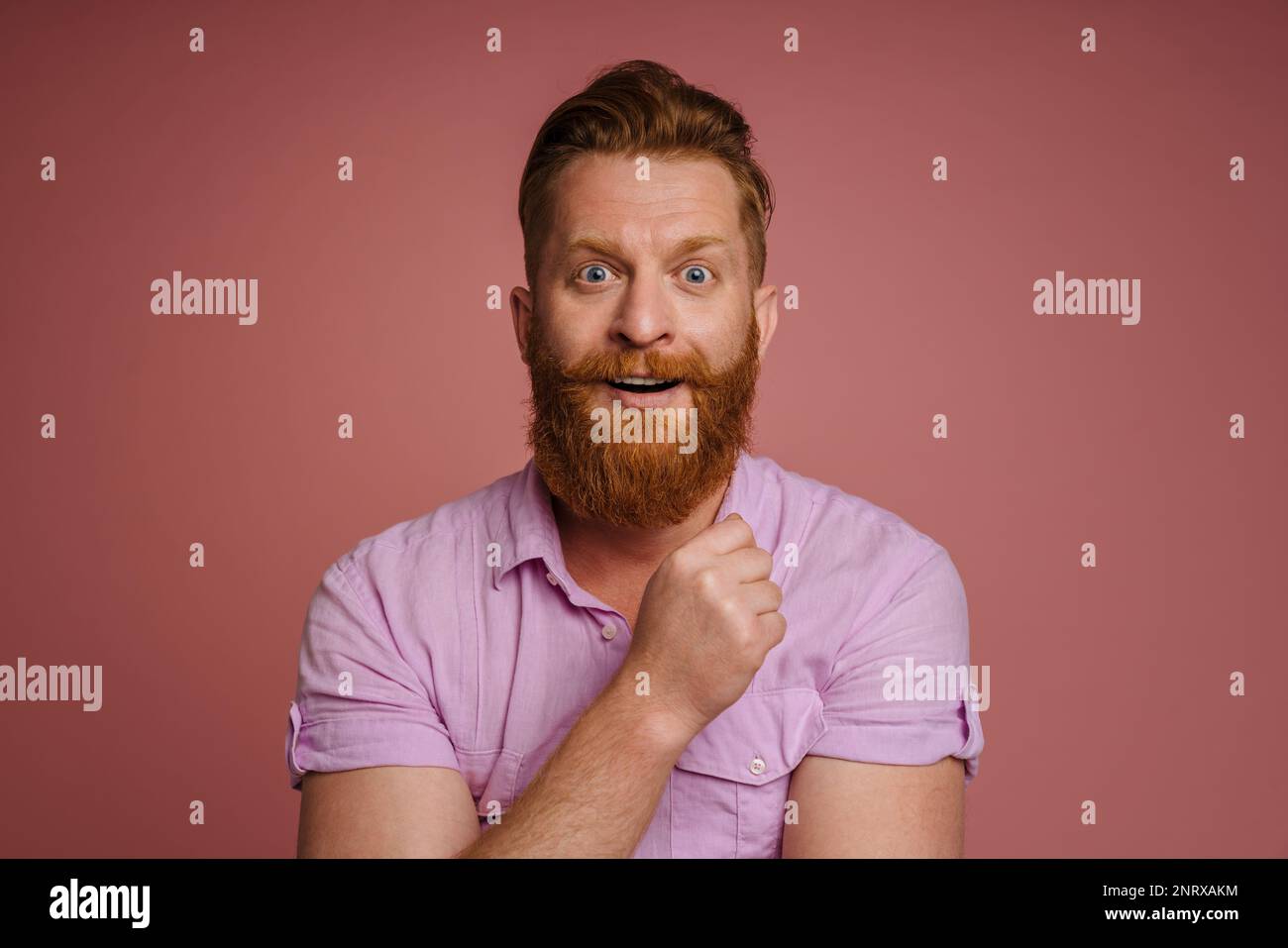 Ginger White Man With Beard Expressing Surprise At Camera Isolated Over