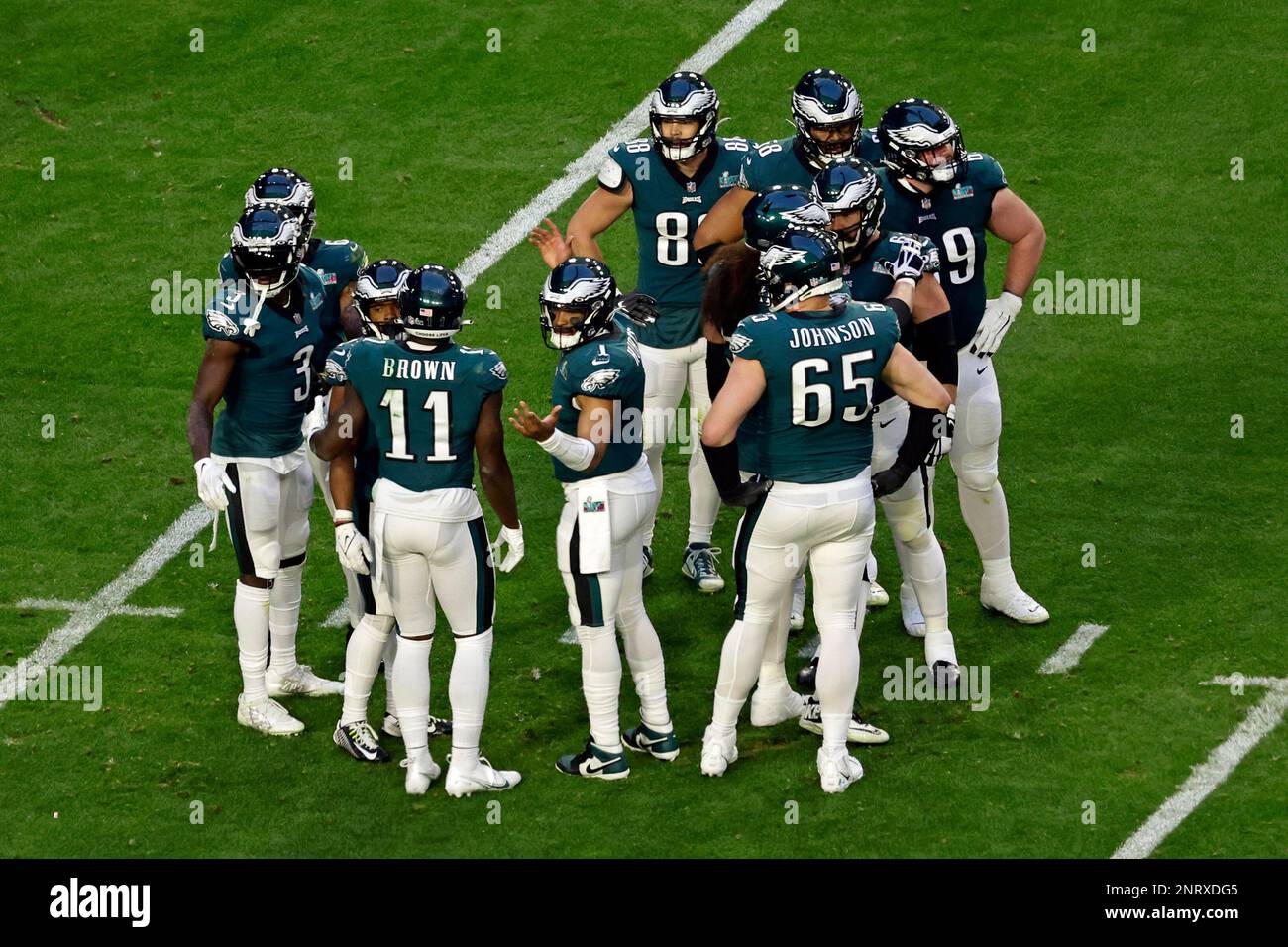 Philadelphia Eagles quarterback Jalen Hurts (1) huddles with teammates ...