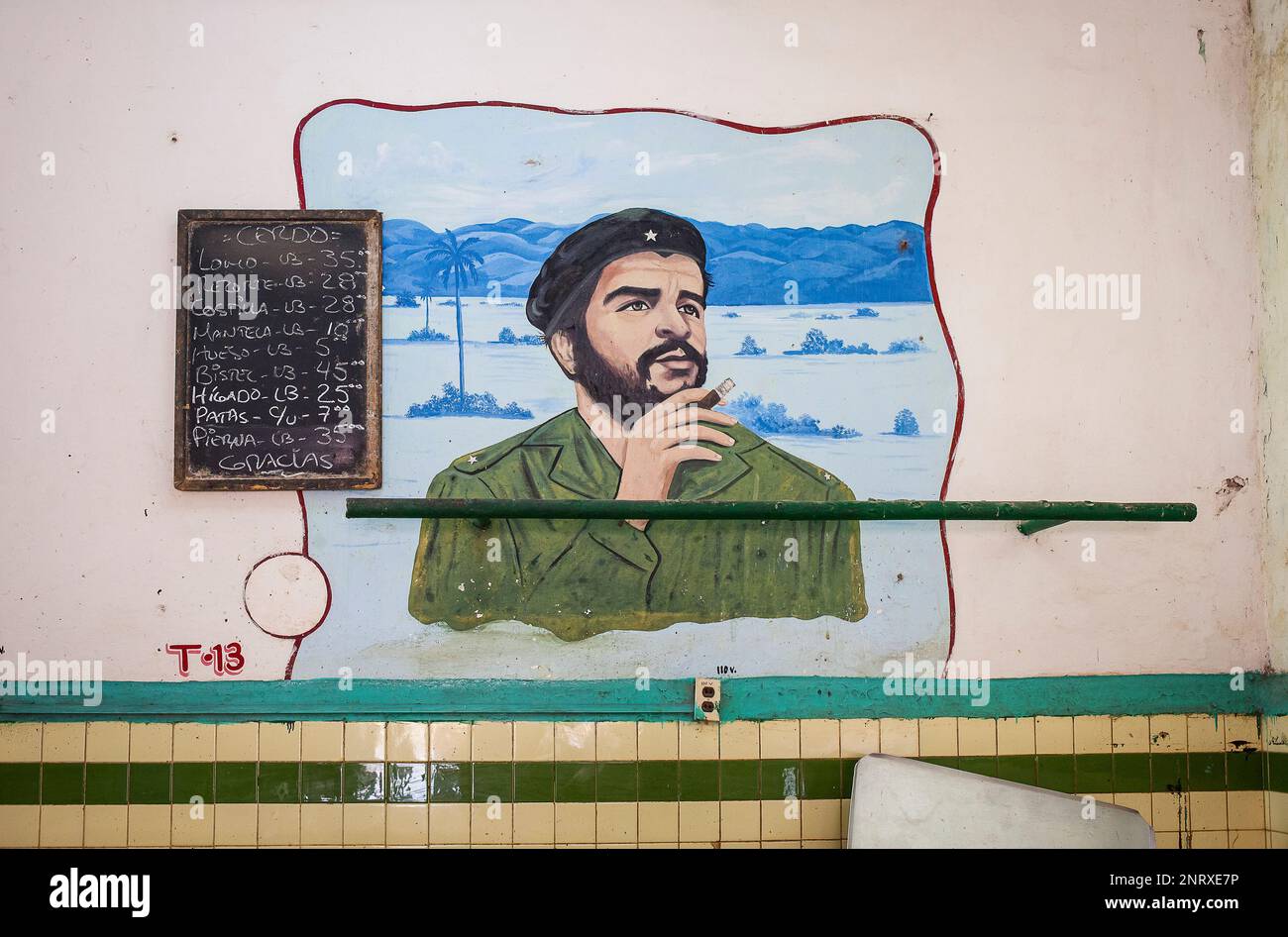 Mural of Che Guevara, and detail of Products provided by the state, at ...