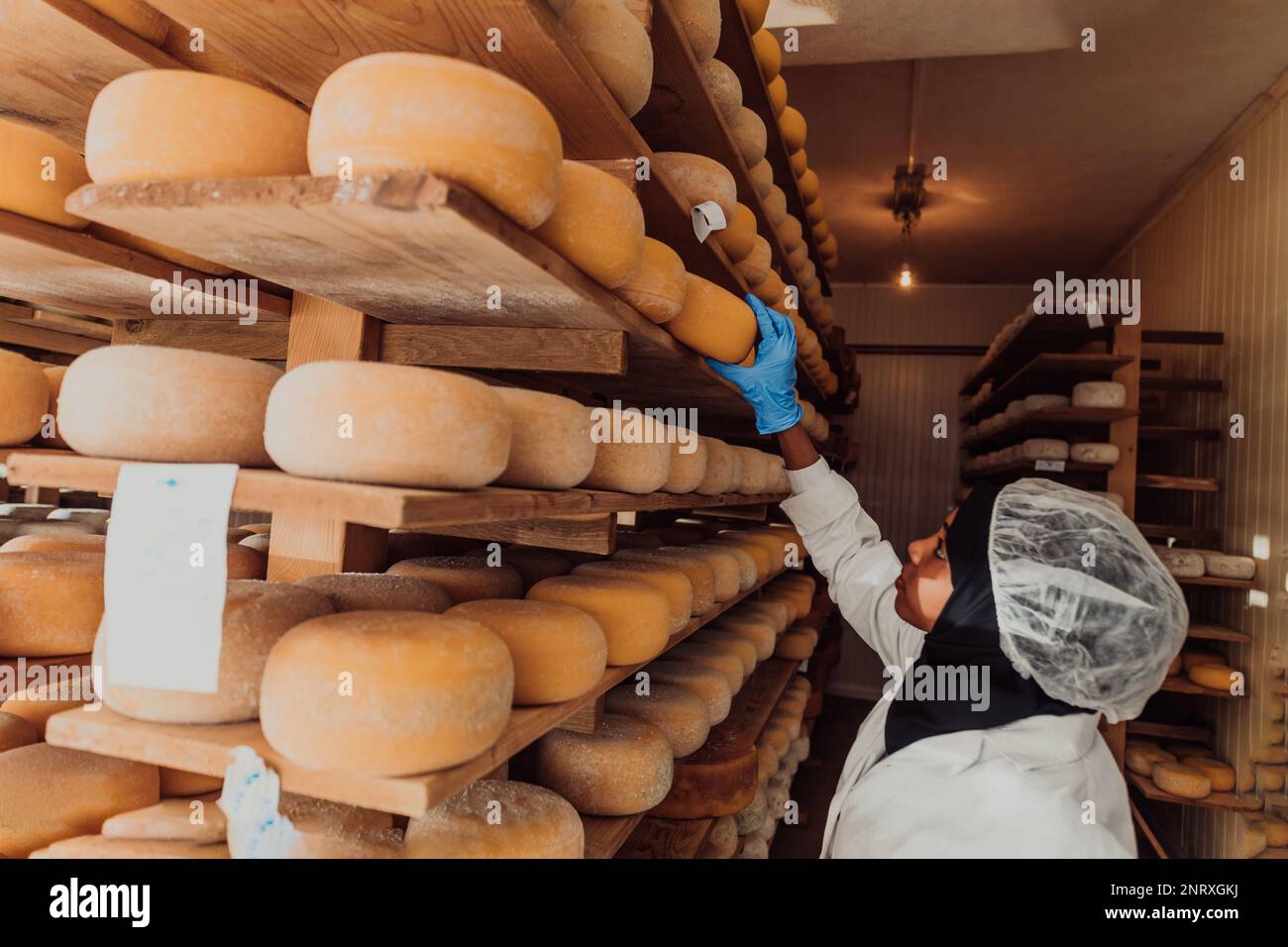 Arab investor in a warehouse of the cheese production industry Stock ...