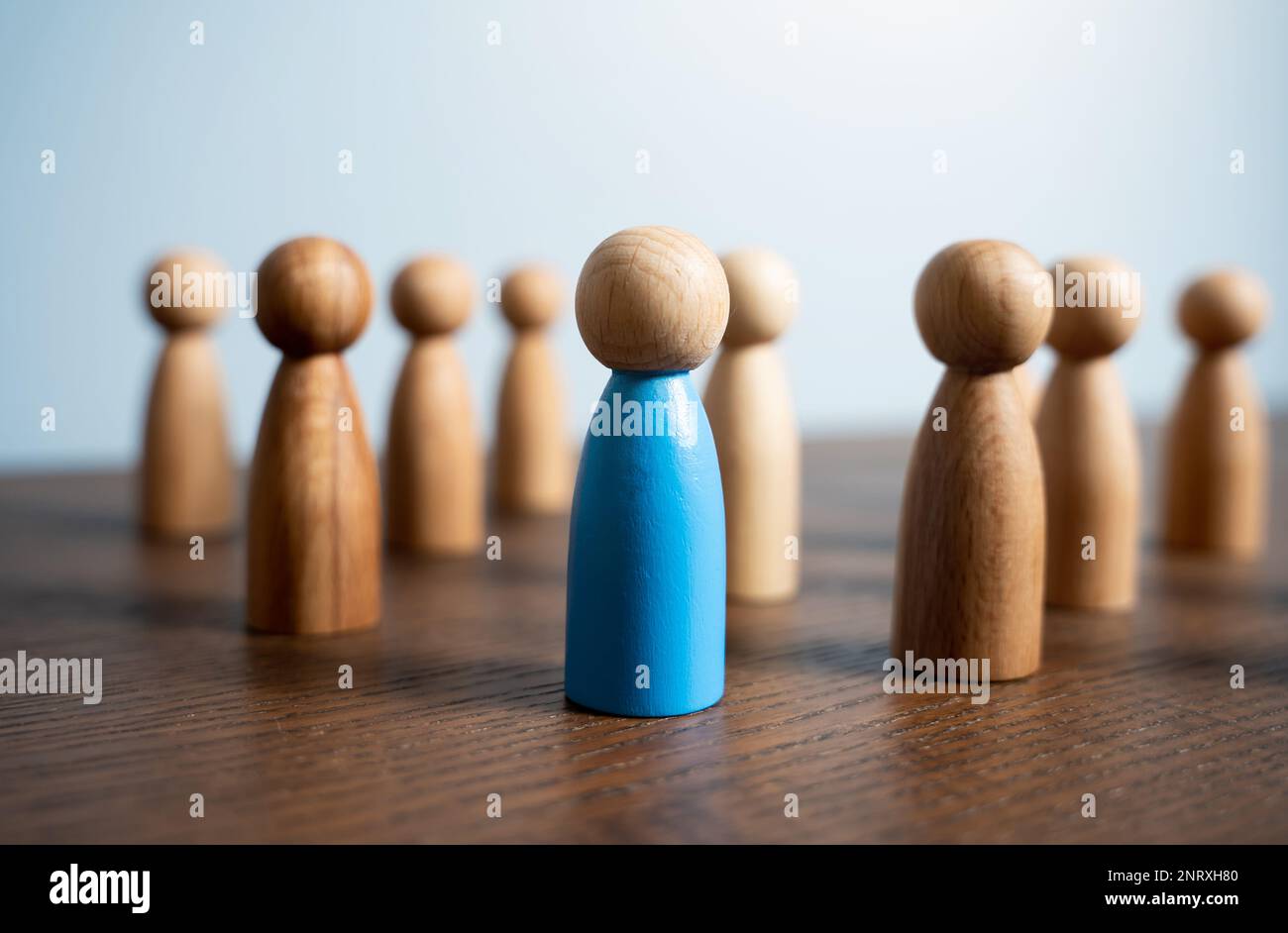 Blue men standing among the crowd. Hiring by competition among ...