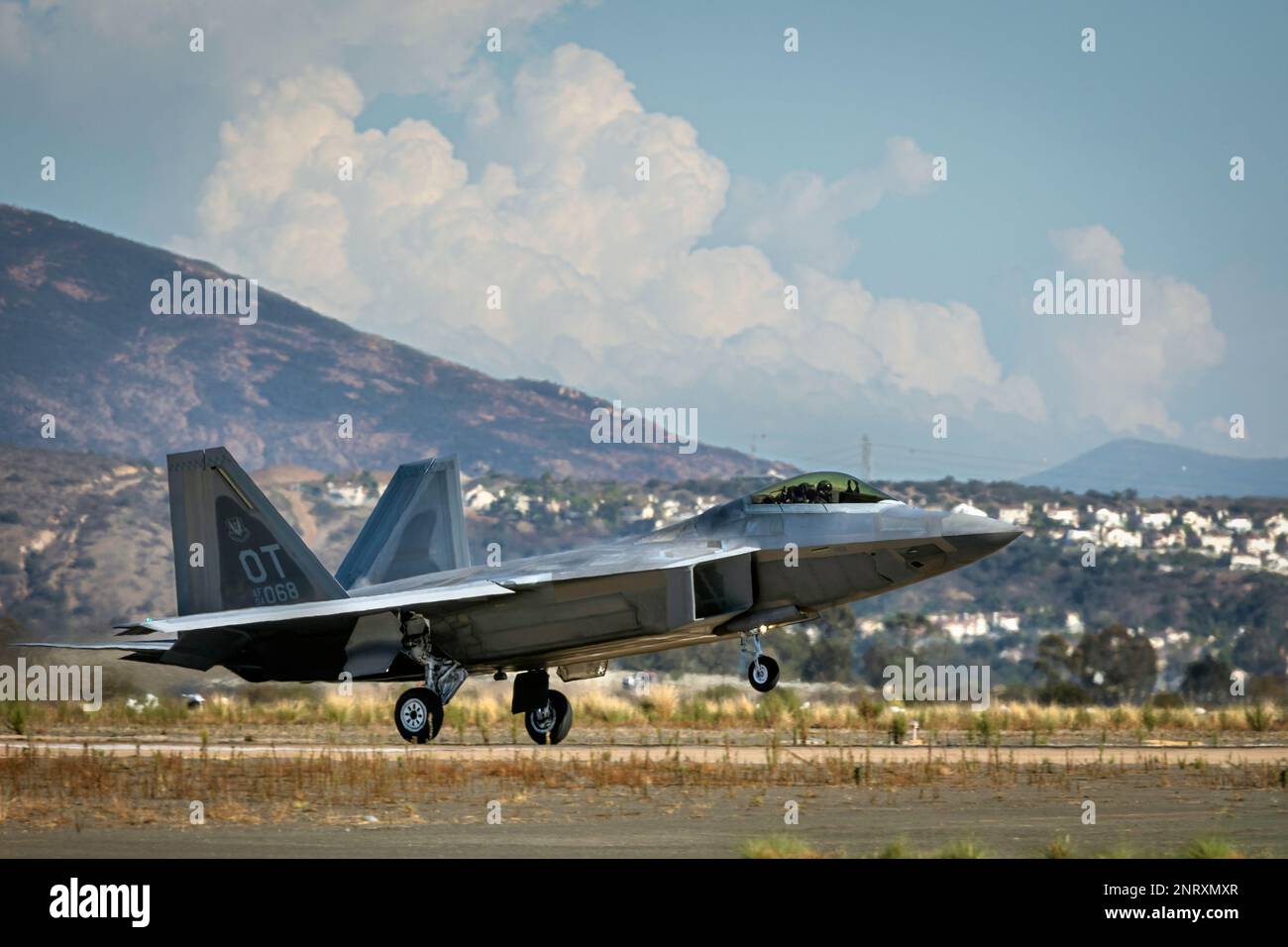 Heat rises from the runway as an F-22 Raptor lands at the 2022 Miramar ...