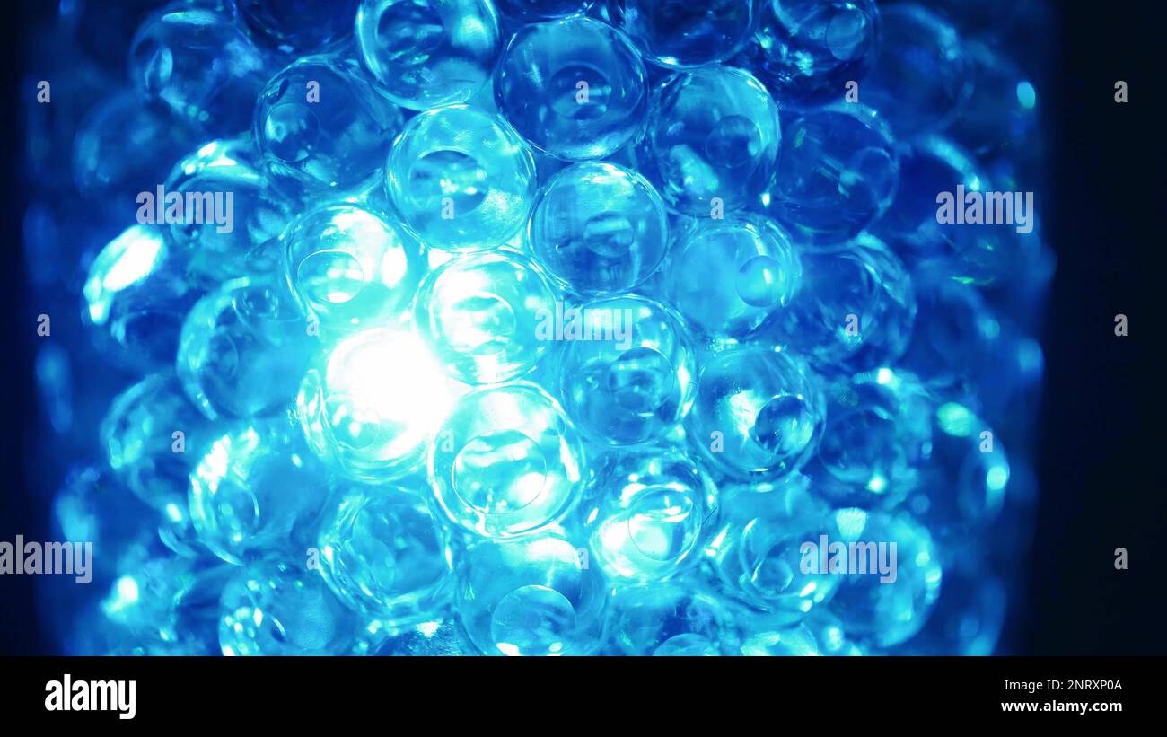Water colored, blue gel balls. Super macro bubbles slow motion ...