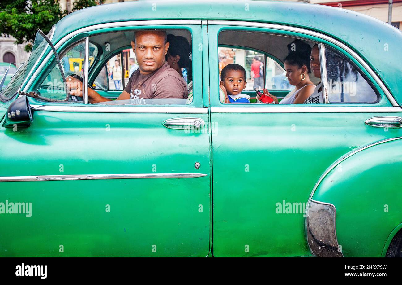 Female latin american taxi driver hi-res stock photography and images ...