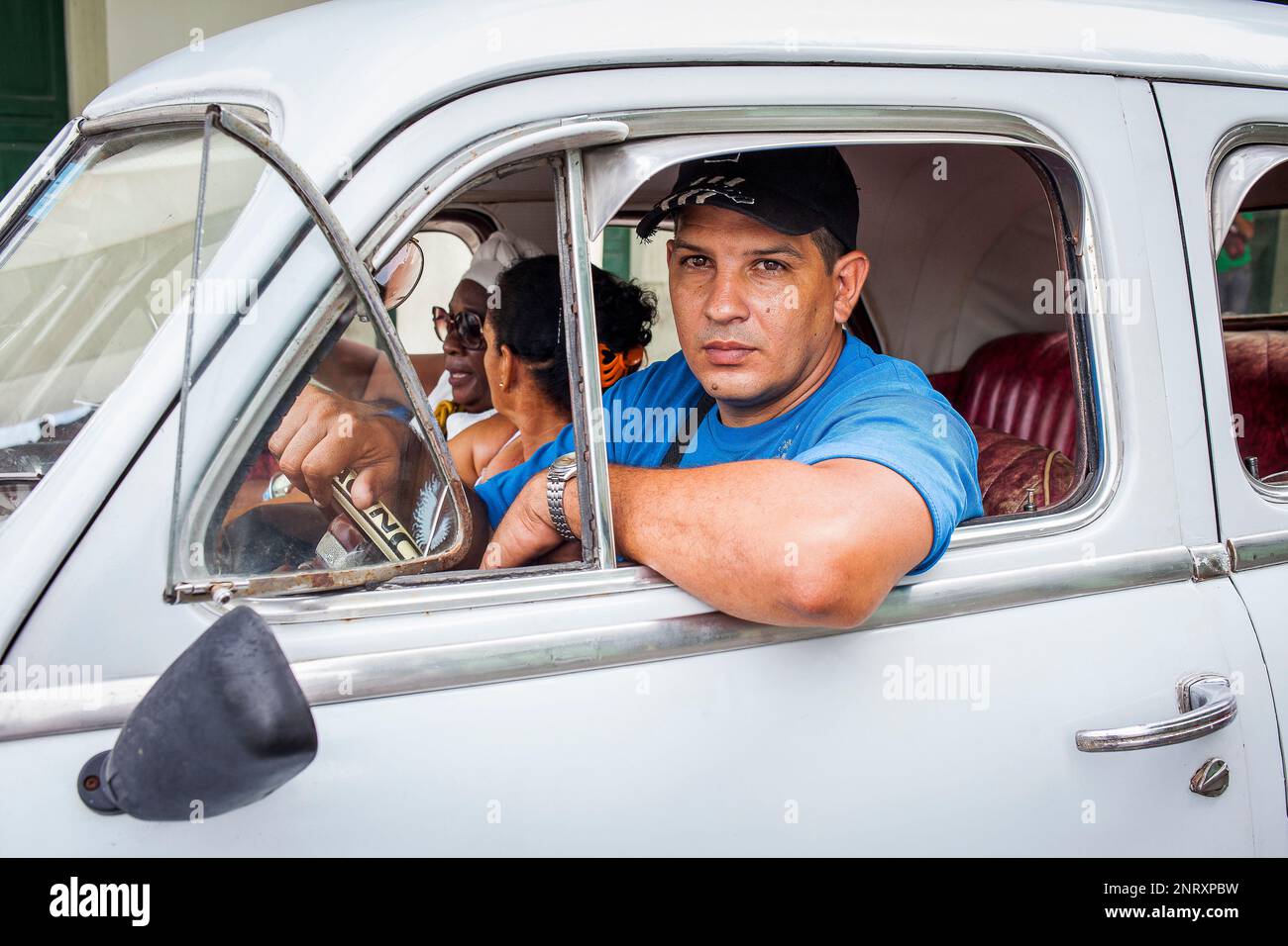 Female latin american taxi driver hi-res stock photography and images ...