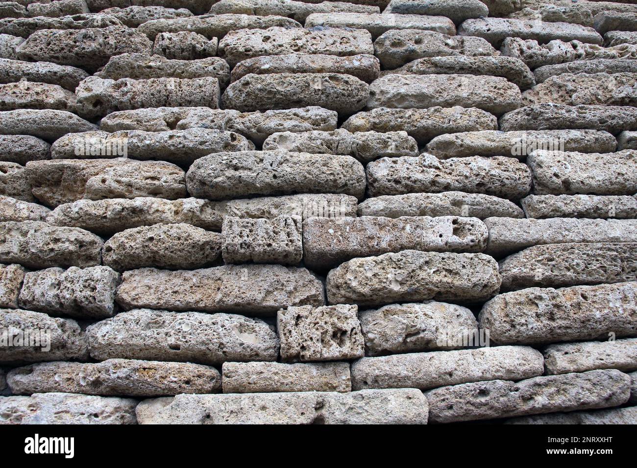 The wall is built of natural stone Stock Photo - Alamy