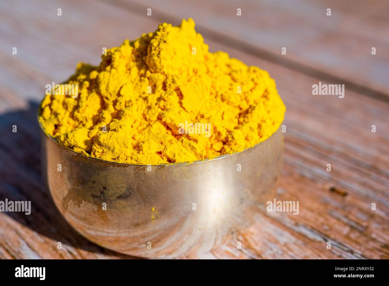 Colorful traditional holi powder in bowl. Space for text. Happy holi ...