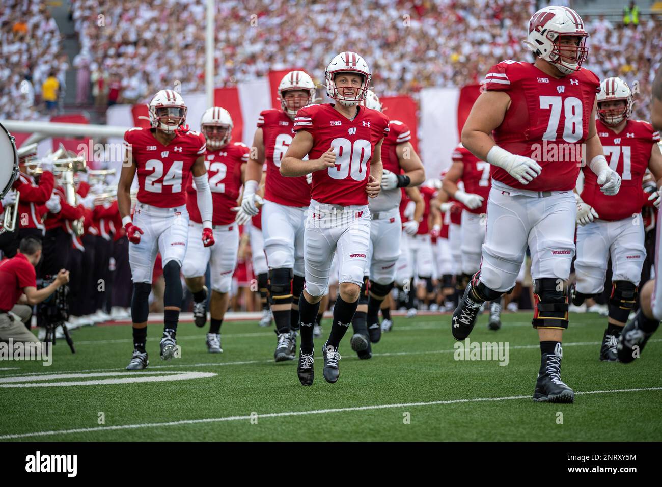 Wisconsin Badgers run onto the field during an NCAA Big Ten Conference ...