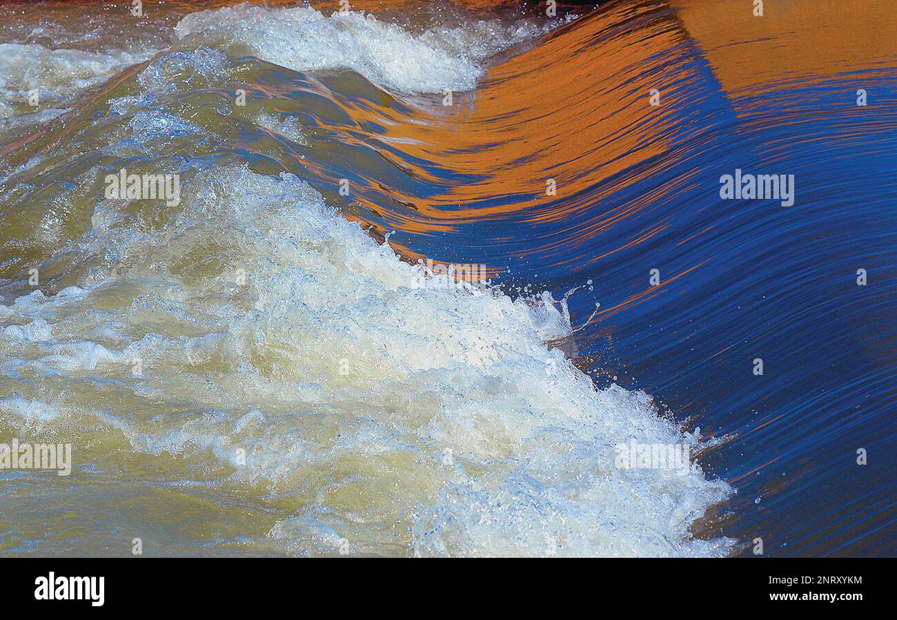Water flows swiftly through the West Main Canal in the Yuma Valley ...