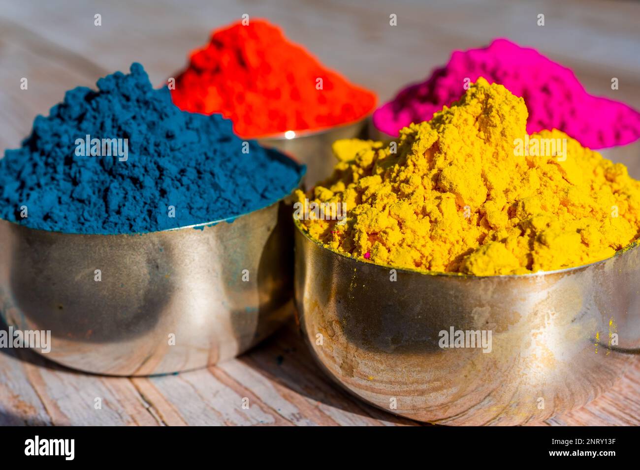 Colorful powder organic Gulal colors in bowls for Indian Holi festival ...
