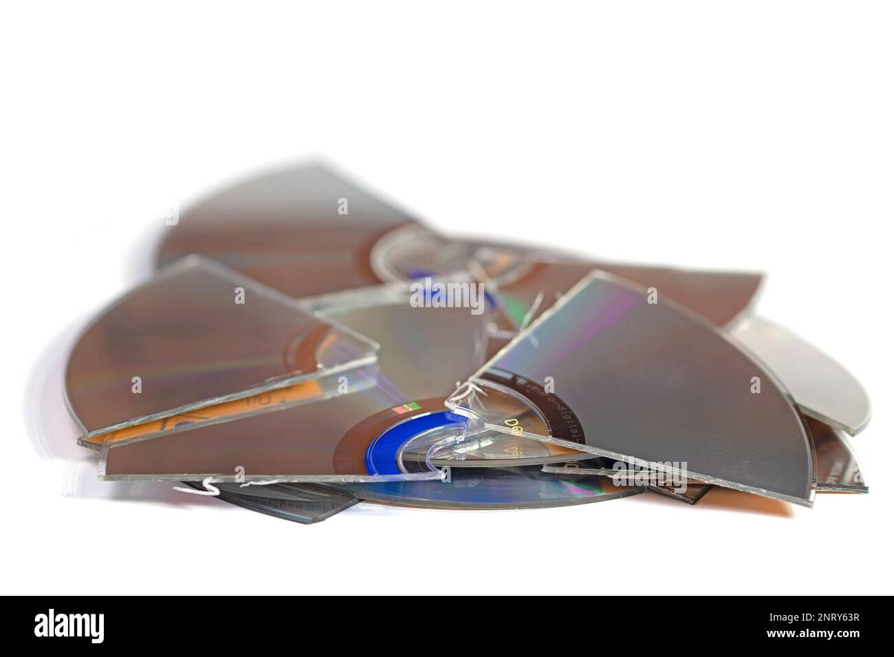 Shredded DVD against white background Stock Photo - Alamy