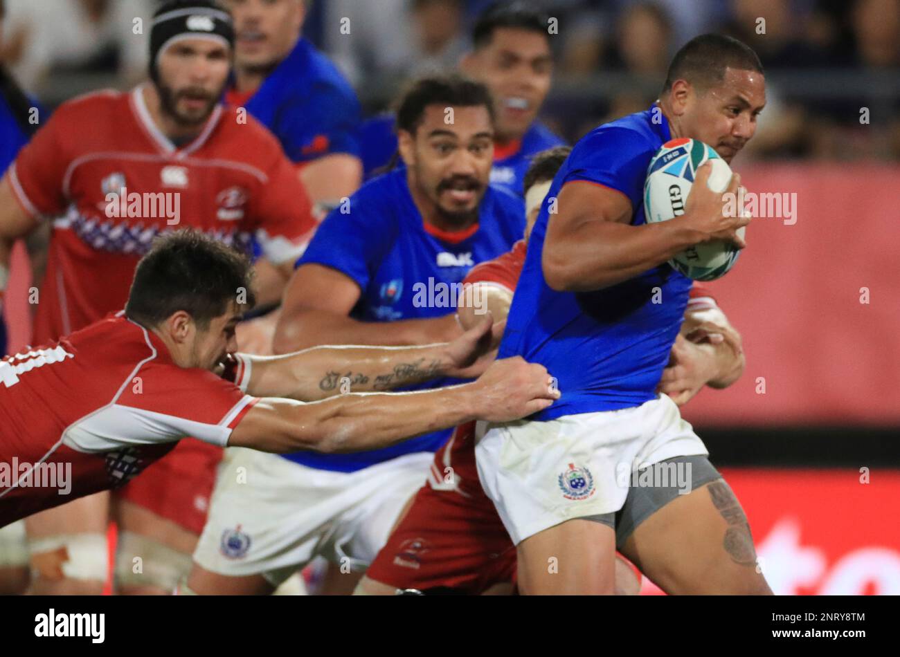 Samoa's Ed Fidow holding a ball runs to goal line prior to his first ...