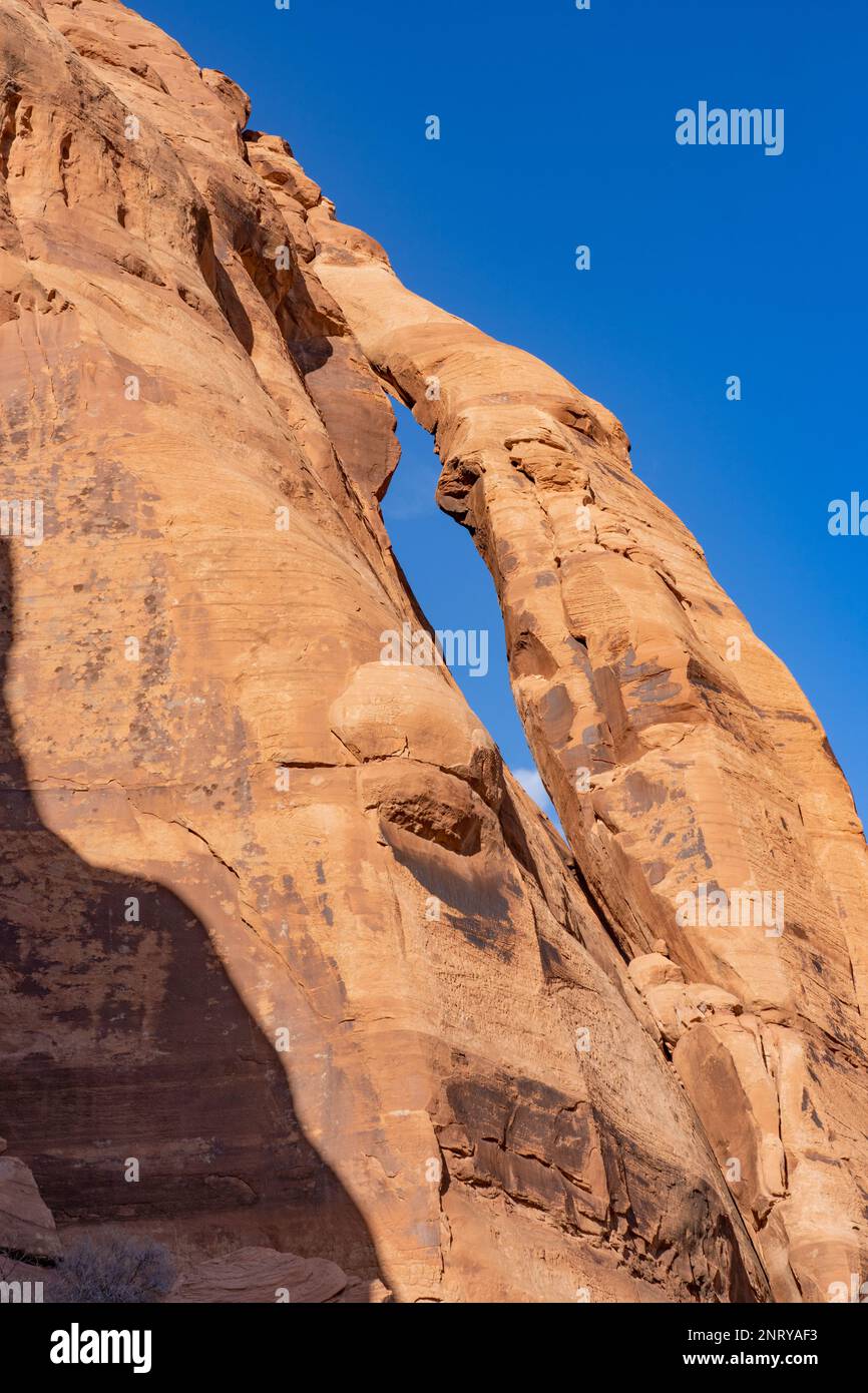 Jug Handle arch, a near vertical arch of Wingate sandstone by the ...
