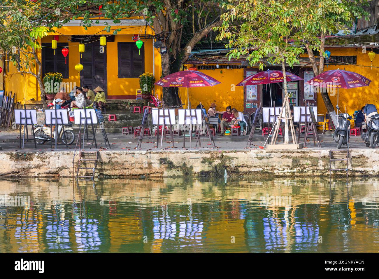 A open air art gallery by the riverside in Hoi An, Vietnam Stock Photo ...