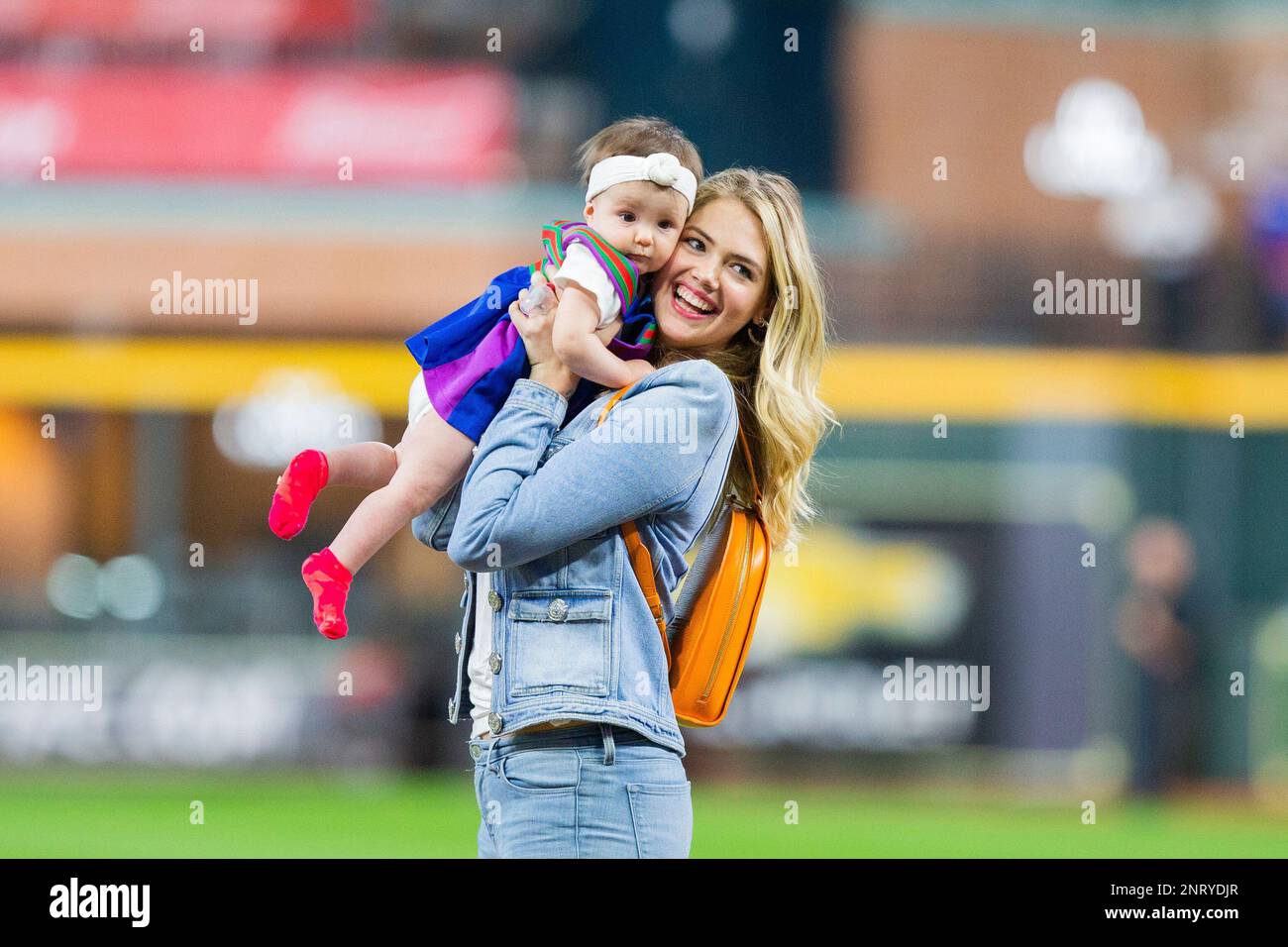 HOUSTON, TX - SEPTEMBER 22: Kate Upton holding her baby daughter ...
