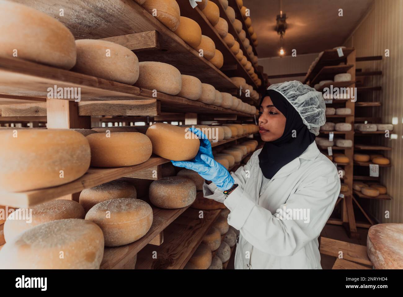 Arab investor in a warehouse of the cheese production industry Stock ...