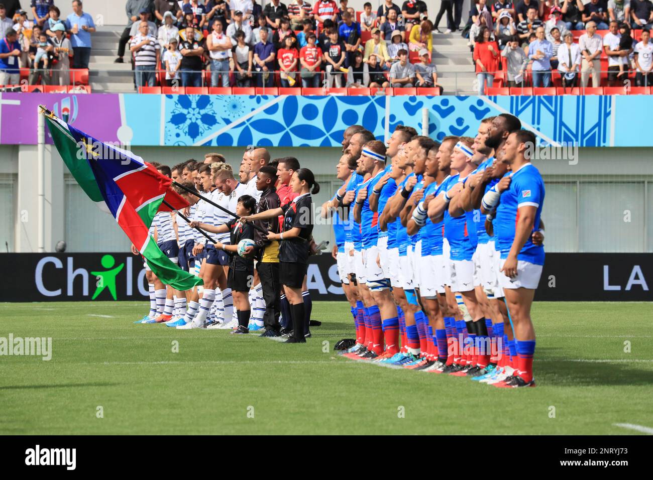 Namibia's players sing a national anthem prior to the Pool C match ...