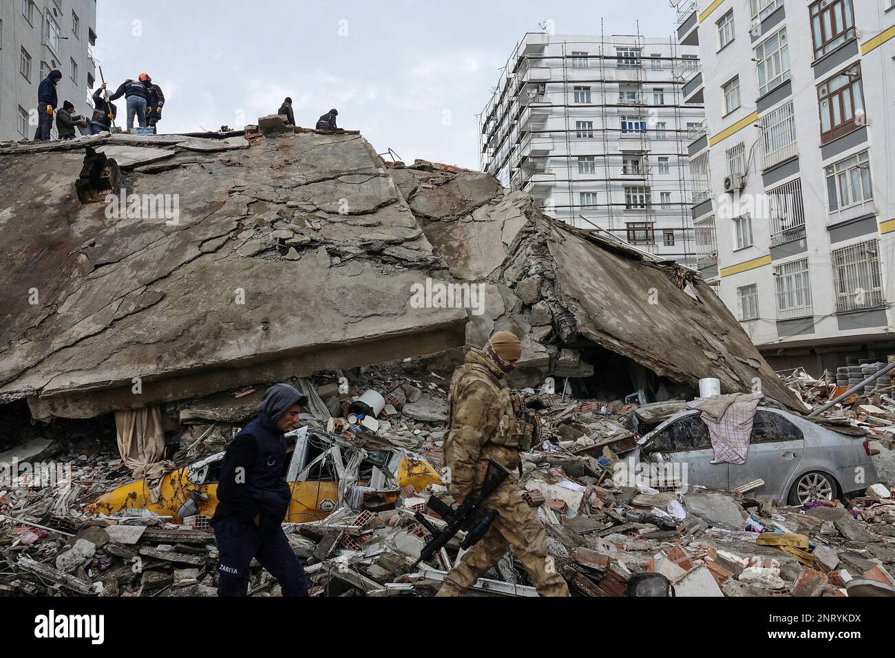 Diyarbakir, Turkey. 27th Feb, 2023. Cars caught in the wreckage were ...