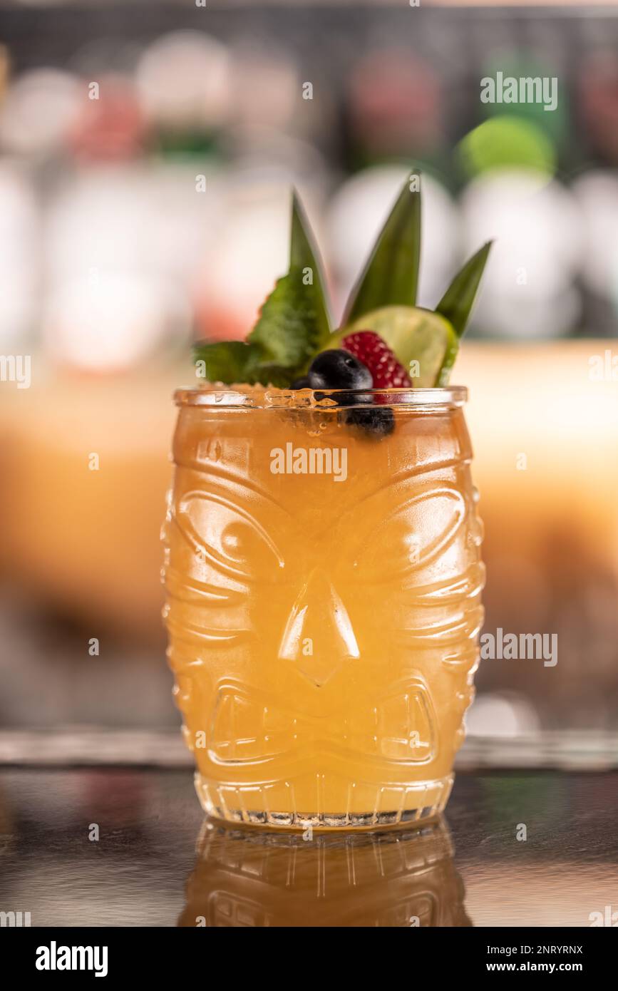 Mai Tai Cocktail On The Bar In The Night Club Tiki Rum Drink Garnished With Pinneaple And