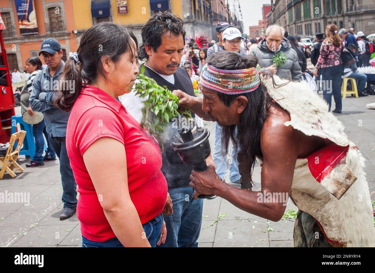 Aztec folk healer, shaman practising spiritual cleansing,Plaza de la ...