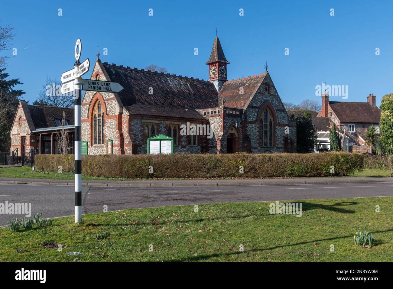 Church on the Green with village signpost in Rowlands Castle, Hampshire ...