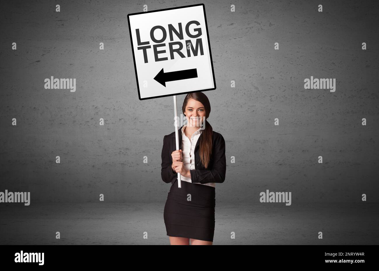 business person holding a traffic sign Stock Photo - Alamy