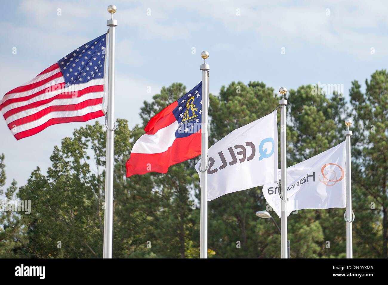 The America flag, the Georgia state flag and the Hanwha Q Cells flag ...