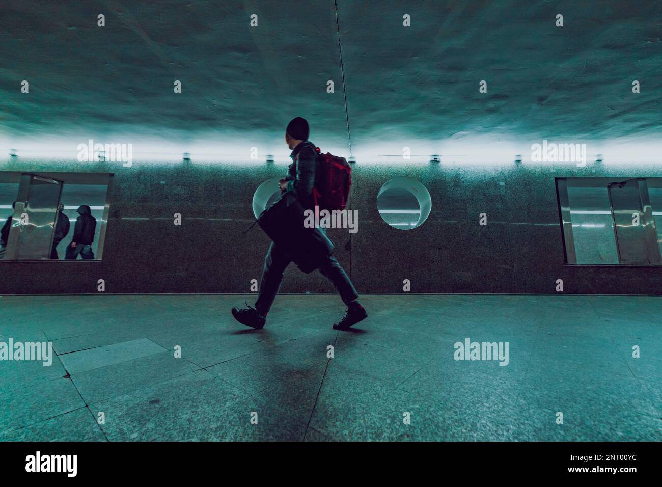 Person with backpack hi-res stock photography and images - Alamy