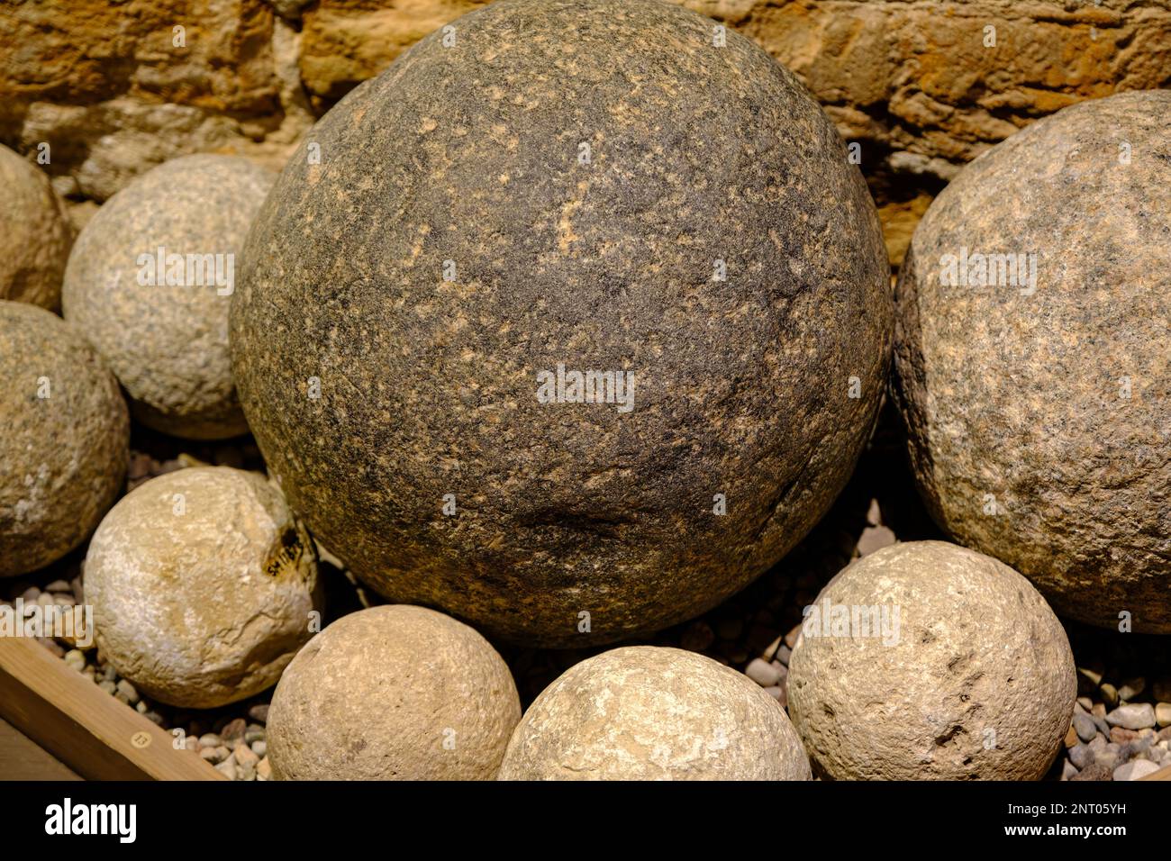 Ancient cannonballs made of stone. Turaida Museum exhibit, Latvia Stock ...
